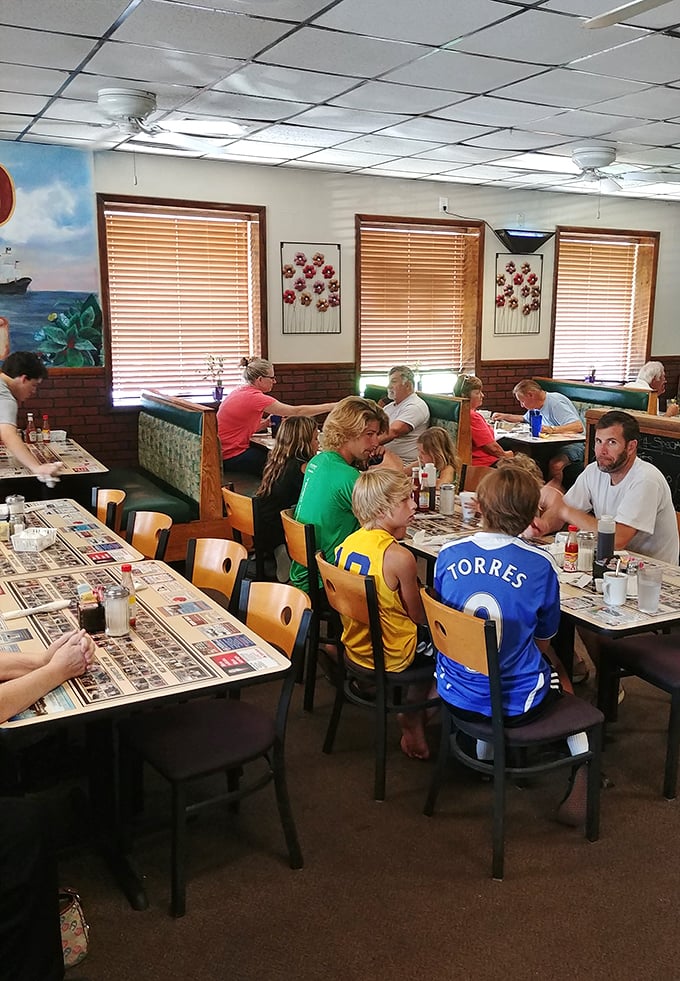 The dining room buzzes with that unique energy of a community cornerstone. Sports jerseys, family gatherings, and the pleasant hum of regulars sharing both news and nonsense.