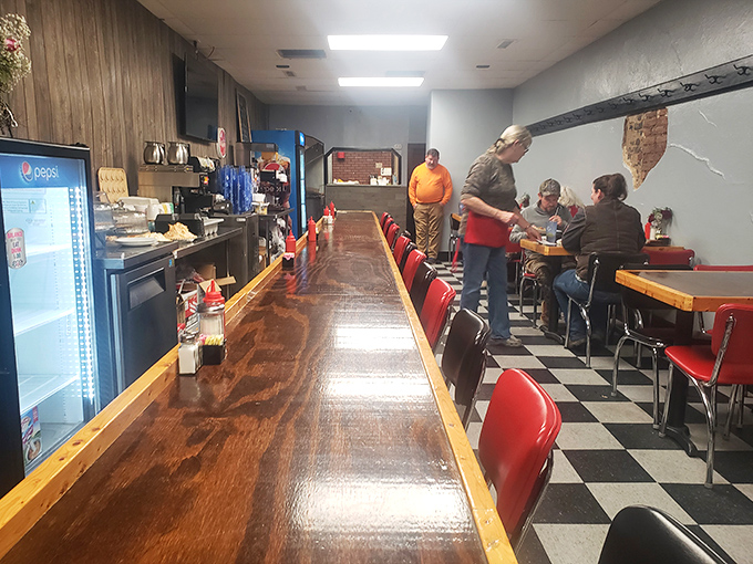 The lunch counter where farmers sit next to lawyers, where everyone's equal in the pursuit of honest food and hometown gossip.
