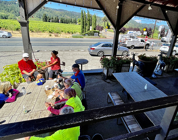 The outdoor seating area offers vineyard views that pair perfectly with sandwiches, turning lunch into what vacation memories are made of.