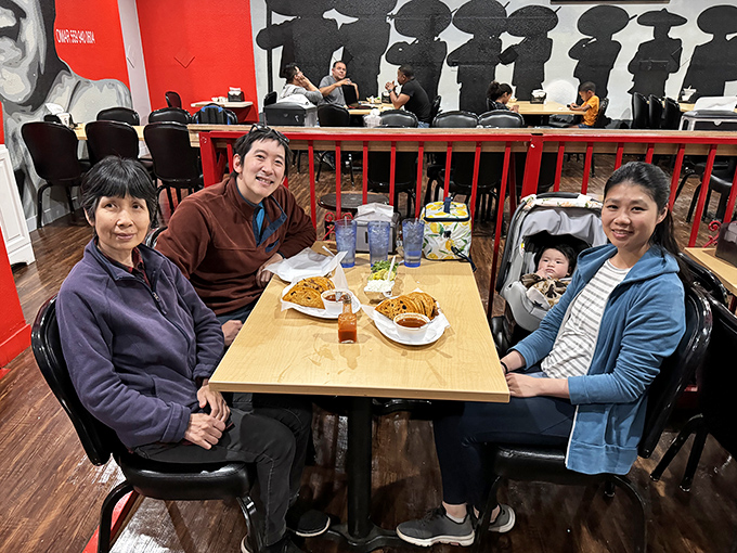 The ultimate testament to great food: a family spanning three generations, all equally entranced by what's happening on their plates.