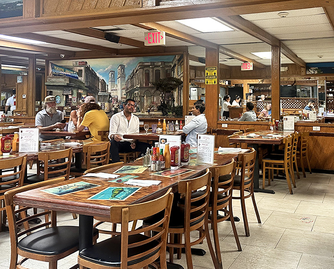 The restaurant hums with the universal language of good food, where strangers become temporary family united by the brotherhood of Cuban cuisine.