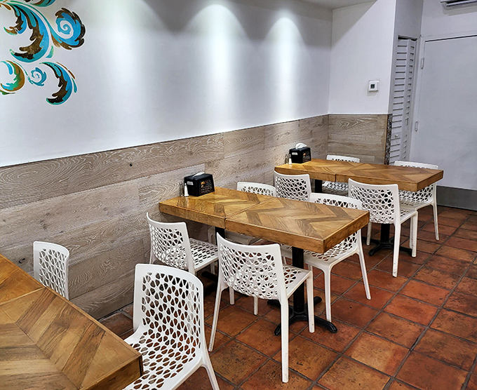 Modern meets traditional with wooden tables and designer chairs. Cuban comfort food deserves a comfortable place to enjoy it.