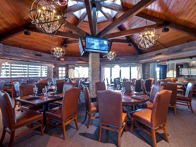 Leather chairs and sphere chandeliers create a dining room where John Wayne would feel at home ordering a Manhattan.