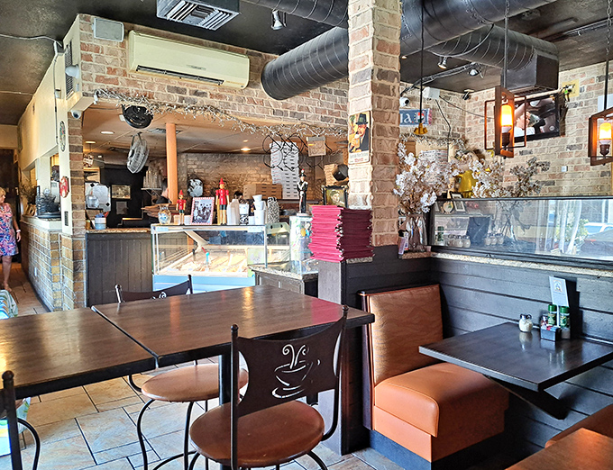 Exposed brick, warm lighting, and thoughtful design create a space where memories are made alongside meals. Every corner tells a story.