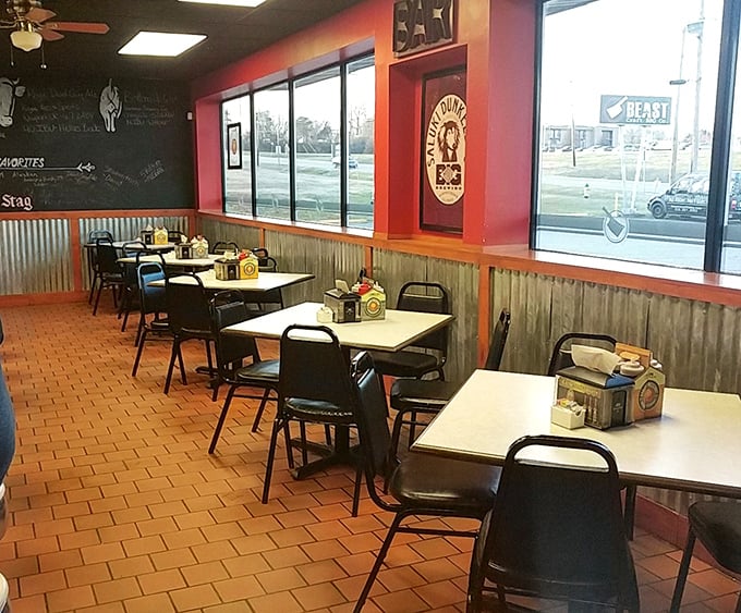 Red walls, corrugated metal, and chalkboard menus create the perfect backdrop for the serious business of barbecue appreciation.