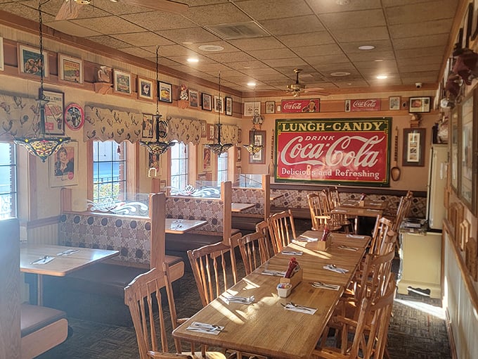 The dining area balances nostalgia with comfort, where vintage Coca-Cola signs remind you that some things never go out of style.
