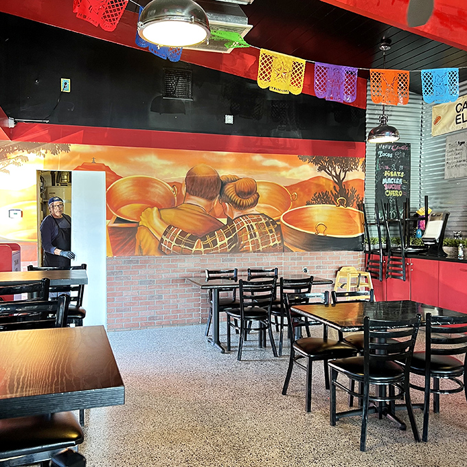 The mural depicting traditional copper cazos honors the cooking method that makes these carnitas special. History and flavor merge on these walls.