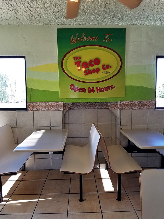 The sign promises 24-hour service, which is dangerous knowledge when midnight cravings strike and willpower is low.