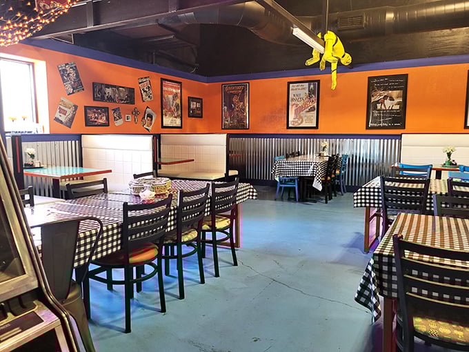 The dining area's corrugated metal walls and orange accents create the perfect backdrop for food that doesn't need Instagram filters to look good.