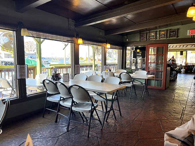 Waterfront dining where every table feels like the best seat in the house. Those windows frame Lake Eustis like living paintings.