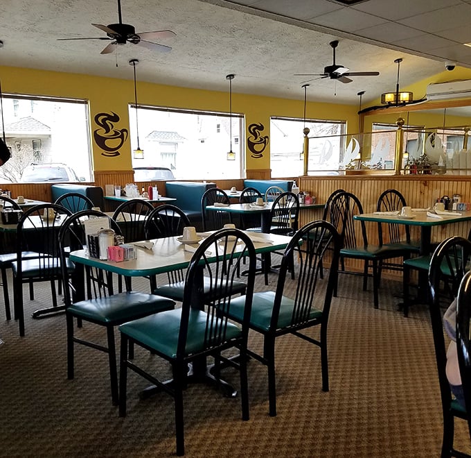 Where blue booths and sunshine-yellow walls create an atmosphere so welcoming, even introverts forget to check their phones.