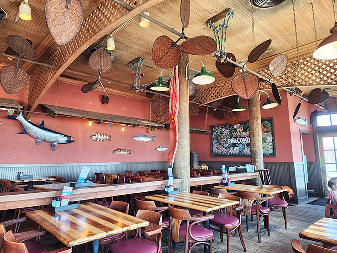 Vintage ceiling fans, wooden beams, and fish mounted on coral-colored walls&mdash;it's like dining inside the world's most delicious fishing boat.