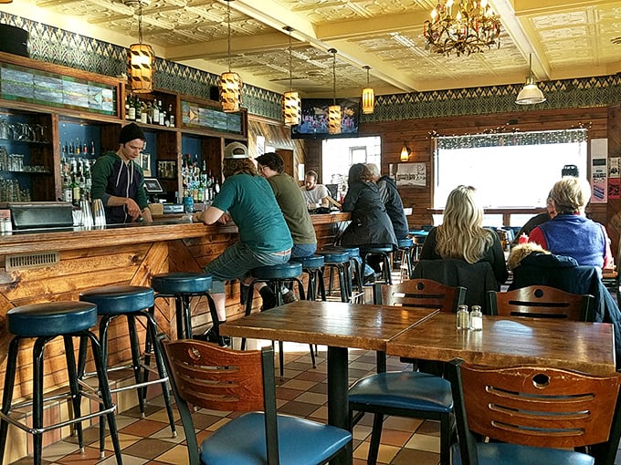 Morning light streams through windows, illuminating a bar area where early birds gather for that first magical cup of coffee.