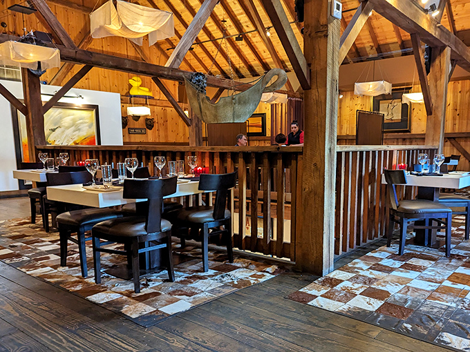 Dining pods carved from history. Each table offers its own micro-environment of culinary delight within the barn's warm embrace.