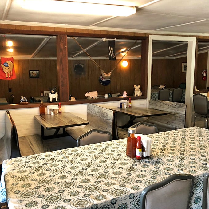 Tablecloths and pig figurines&mdash;the dining room decor at B's reminds you that priorities are firmly in the right place.