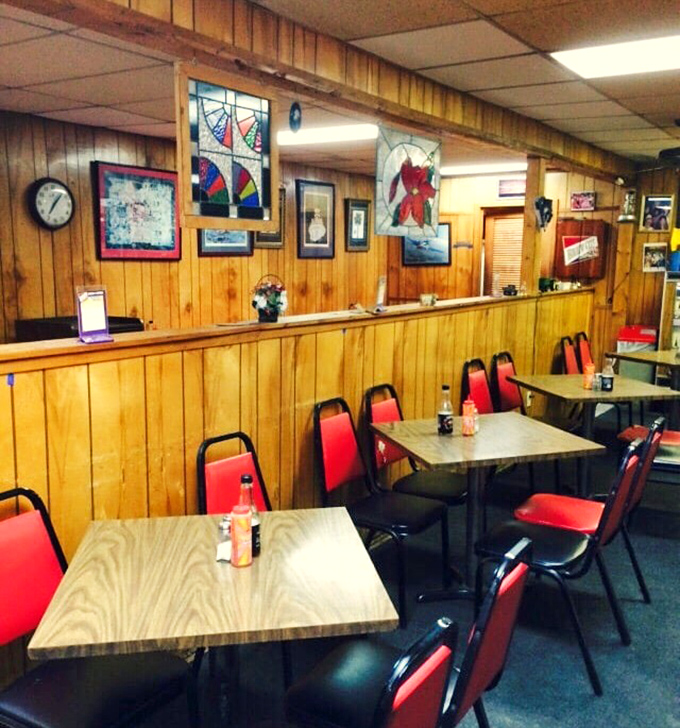 Red chairs against wood paneling&mdash;not designed by some bearded hipster, but perfected through decades of knowing exactly what matters.
