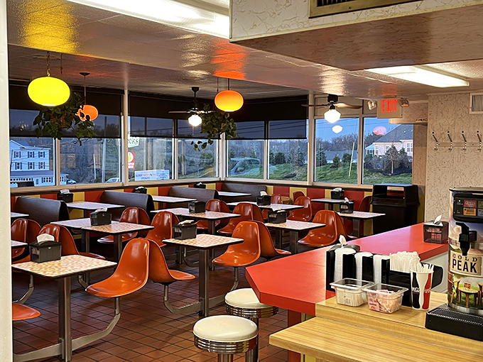 Orange chairs that have witnessed countless first dates, family celebrations, and "I'm too tired to cook" nights. Retro before retro was cool.