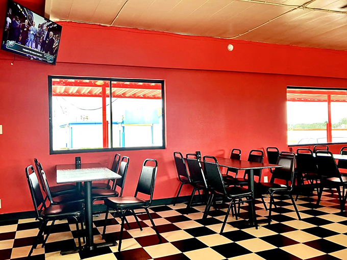 The checkerboard floor and red walls create a diner atmosphere that says, "Sit down, stay awhile, and prepare for meat sweats."