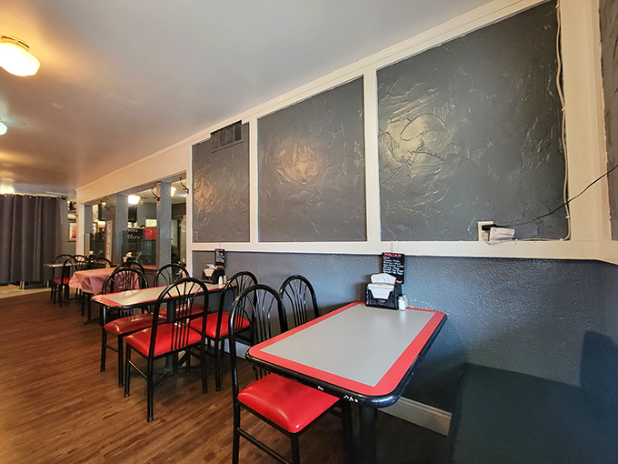 The dining area strikes that perfect balance between "neighborhood joint" and "hidden gem," with tables ready to host your next life-changing meal.