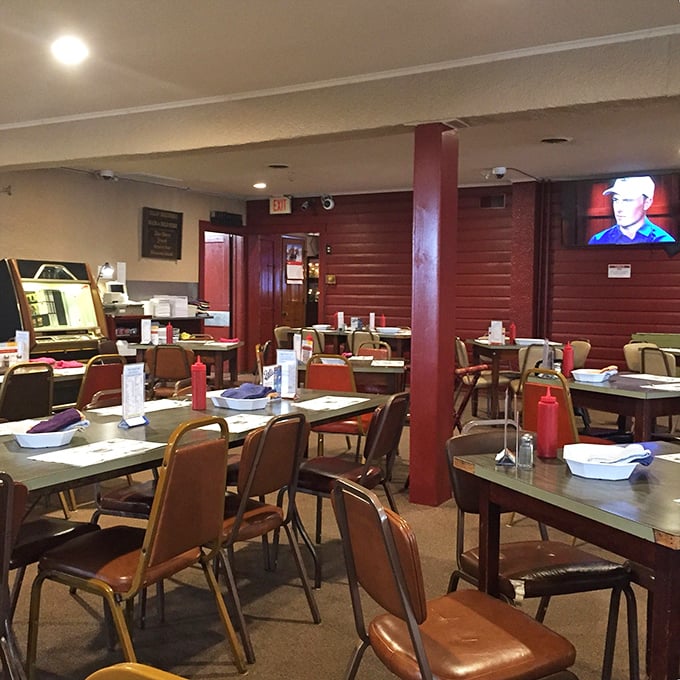 Red pillars, simple tables, and squeeze bottles of sauce standing at attention&mdash;a dining room where memories are made between bites of legendary barbecue.