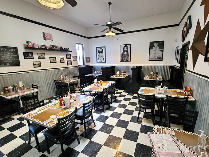 Black and white floors, classic diner tables, and walls that tell stories. It's like eating in a Norman Rockwell painting with better coffee.