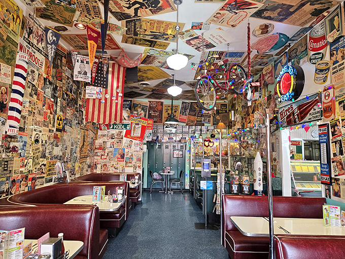 Where every inch of wall space tells a story. The ultimate sensory overload of vintage advertisements, memorabilia, and even a bicycle hanging from the ceiling.