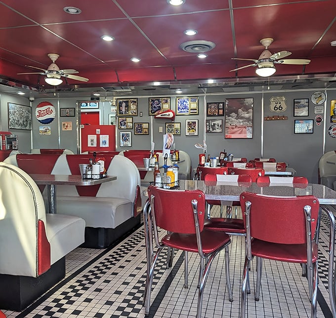 The diner's interior is a symphony in red and white, where every booth feels like the best seat in the house.