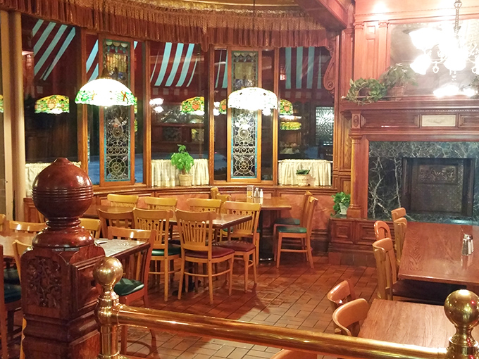 Wood paneling, stained glass, and Tiffany-style lamps create an atmosphere that says, "Yes, breakfast deserves this much respect."