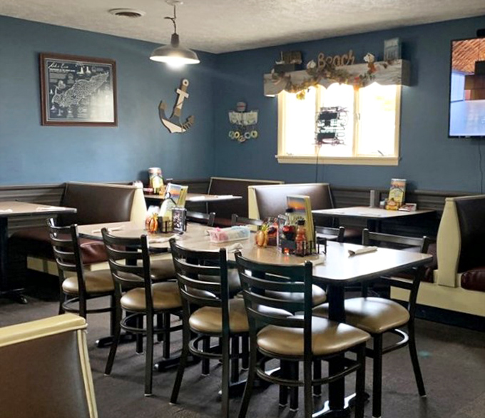 Blue walls and nautical accents create that "lake house you wish you owned" vibe. Comfortable booths designed for lingering conversations.