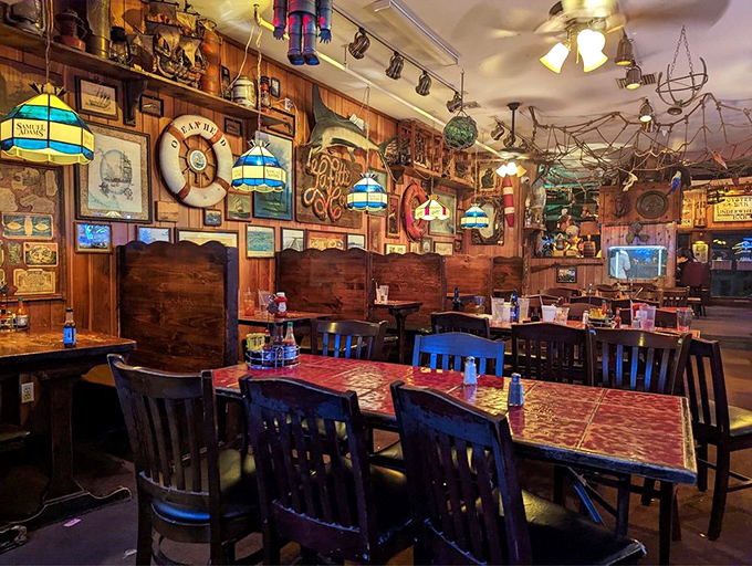 Wooden booths and nautical treasures create the feeling you've stumbled into the world's coziest shipwreck&mdash;one with excellent lighting.