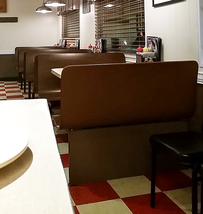 Classic diner booths: where conversations flow easier and food somehow tastes better. The booth's slight wobble is a feature, not a bug.