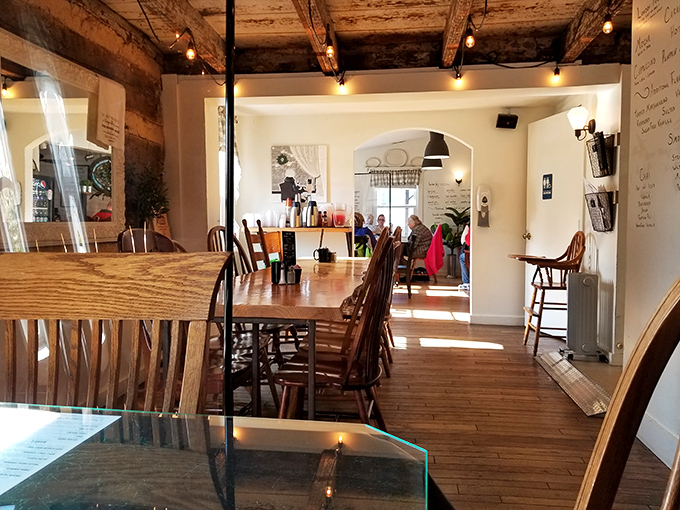 The dining room feels like it was designed by someone who understands that good food deserves beautiful surroundings. Those wooden beams have stories to tell.