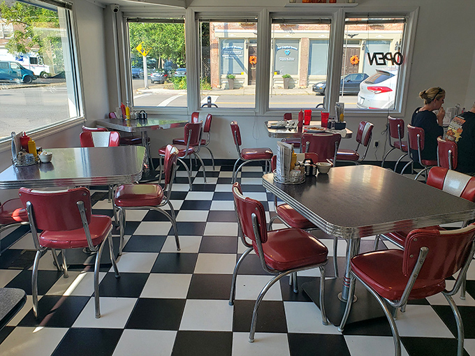 Retro dining perfection where every chrome-edged table has witnessed first dates, family celebrations, and countless "just passing through" travelers becoming regulars.