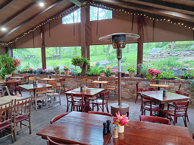 The solarium dining area brings the outside in. Surrounded by plants and natural light, it's like eating in a greenhouse designed by someone with actual taste.