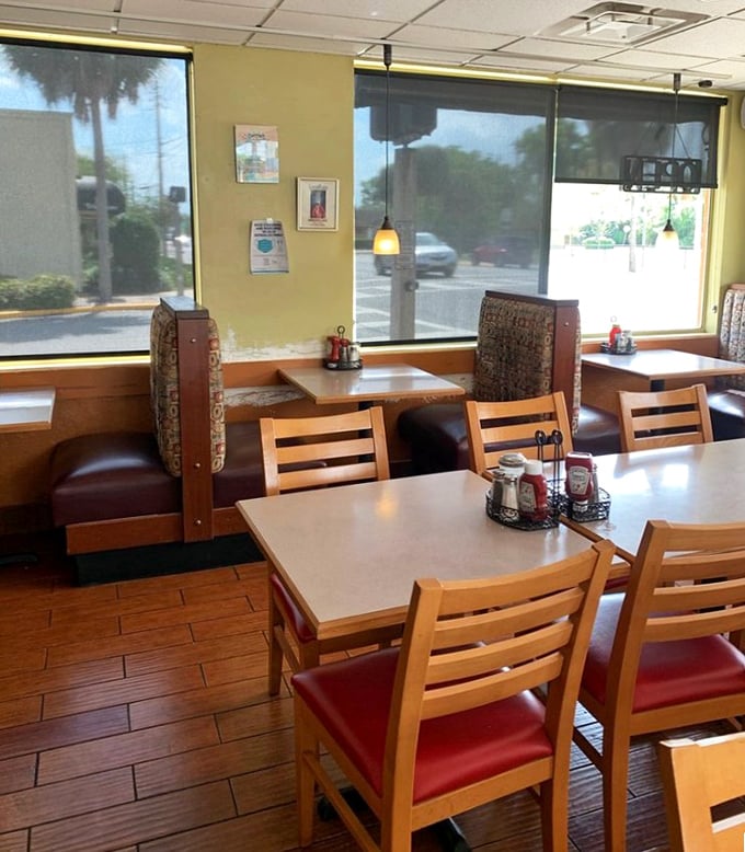 Booths bathed in natural light where countless Florida mornings have been properly inaugurated with coffee and conversation.