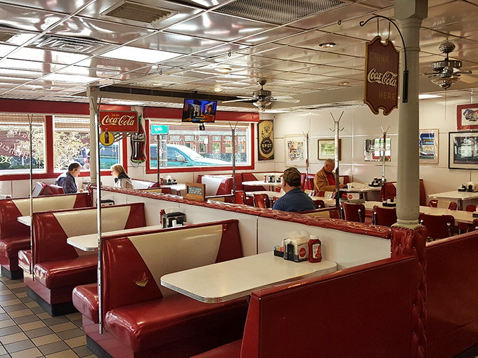 Red booths line the walls like loyal sentinels, having witnessed countless first dates, family celebrations, and "just because it's Tuesday" meals.