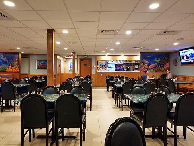 The dining room waits patiently for the seafood enthusiasts to arrive. Those empty chairs will soon hold people having religious experiences over rock shrimp.