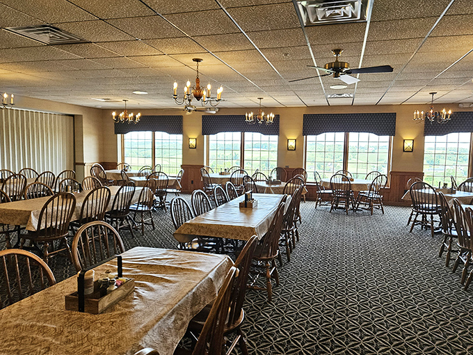 Morning light streams through windows, illuminating a dining room ready for the day's feast. Like a cathedral of comfort food, the space invites reverent appreciation.