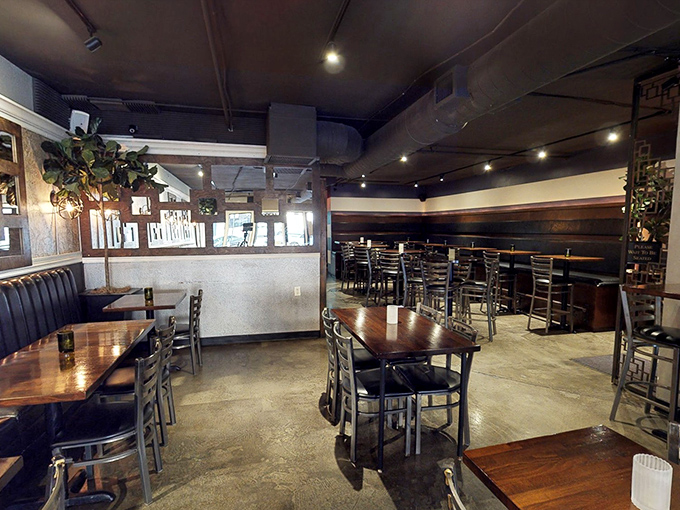 The dining area strikes that perfect balance between "nice enough for date night" and "casual enough to lick your fingers without judgment."
