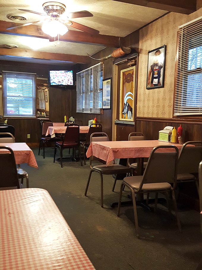 Wood paneling, ceiling fans, and checkered tablecloths&mdash;this dining room hasn't changed in decades because perfection needs no updating.