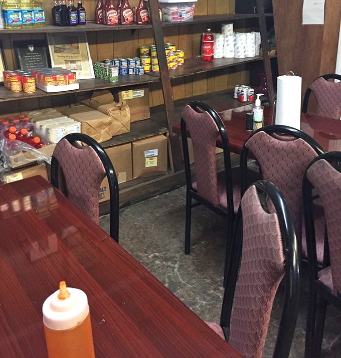 Simple chairs, wooden shelves stocked with essentials, and tables where barbecue memories are made. No interior designer needed when the food's this good.