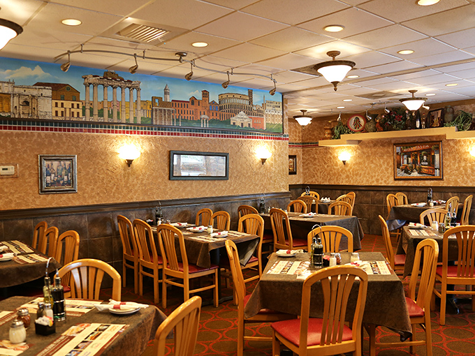 A dining room where Roman murals meet Southern hospitality. Those wooden chairs have heard countless "pass the bread" requests over the years.
