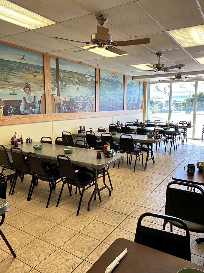 The dining area buzzes with conversation and clinking silverware, where strangers become friends over shared breakfast adventures.