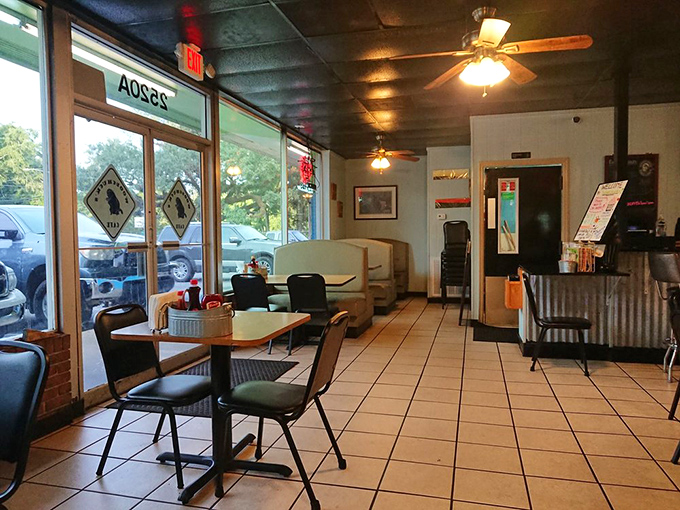 The dining room buzzes with that perfect mix of locals and visitors all discovering something truly special together.