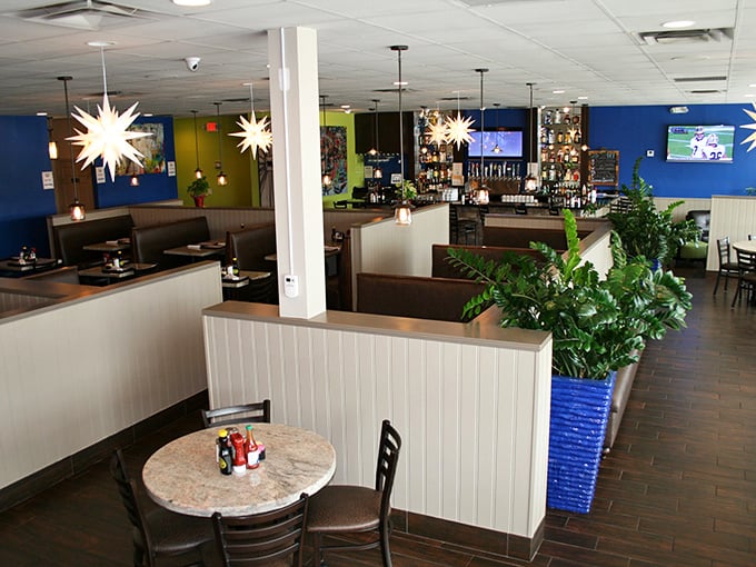 The dining area strikes that perfect balance between "nice enough for a date" and "comfortable enough to nurse your hangover."