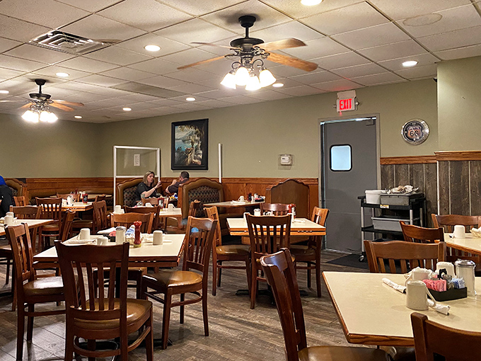 A dining room where strangers become neighbors and calories don't count. The ceiling fans keep the air moving, but tradition stands still.