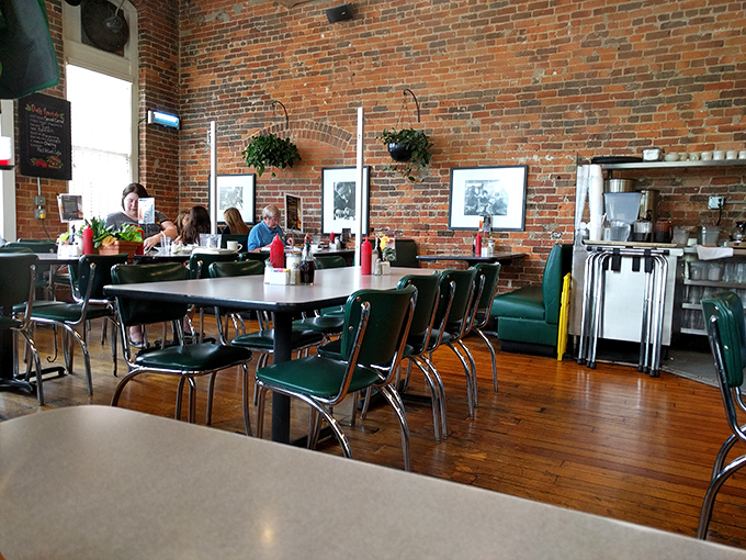 Exposed brick walls and classic diner chairs create that perfect "third place" between home and work. The kind of spot where regulars become family. 