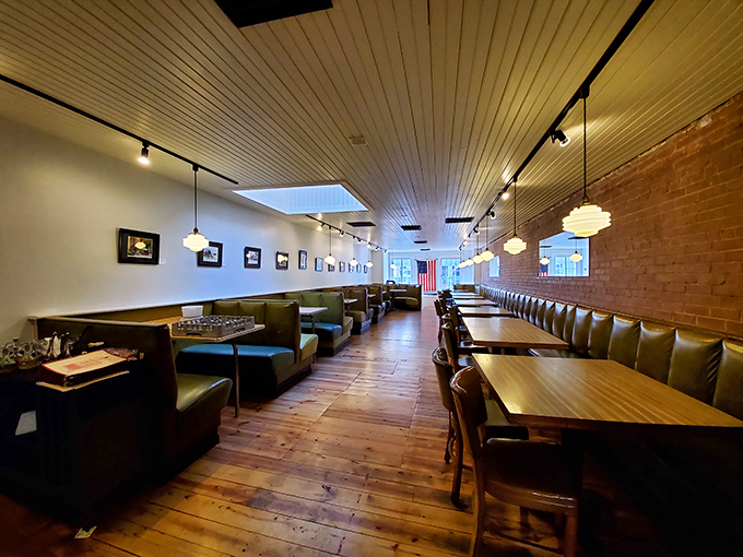 Wooden floors that have witnessed thousands of conversations, booths that invite you to settle in, and lighting that flatters everyone&mdash;diner design perfection.