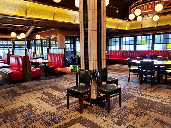 Red booths, warm lighting, and thoughtful design&mdash;this isn't just a dining room, it's the living room you wish you had if you were a better decorator.