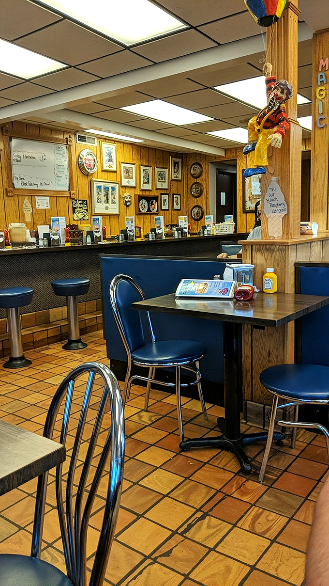 Wood paneling and blue booths&mdash;the unofficial uniform of classic American diners. Not designed by an Instagram influencer, but by decades of practical comfort.